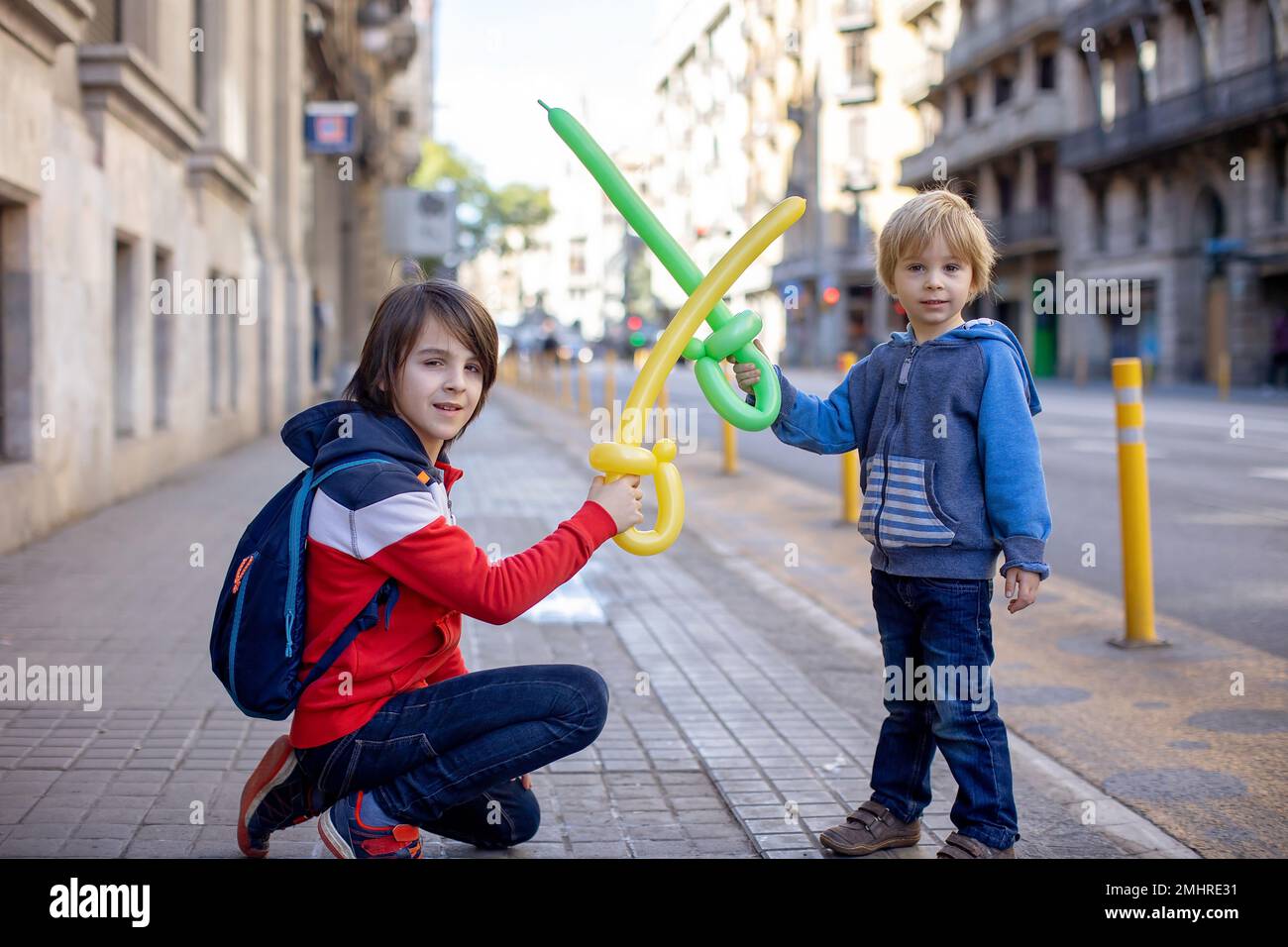 Cute little children tourists admiring Barcelona city, family travel ...