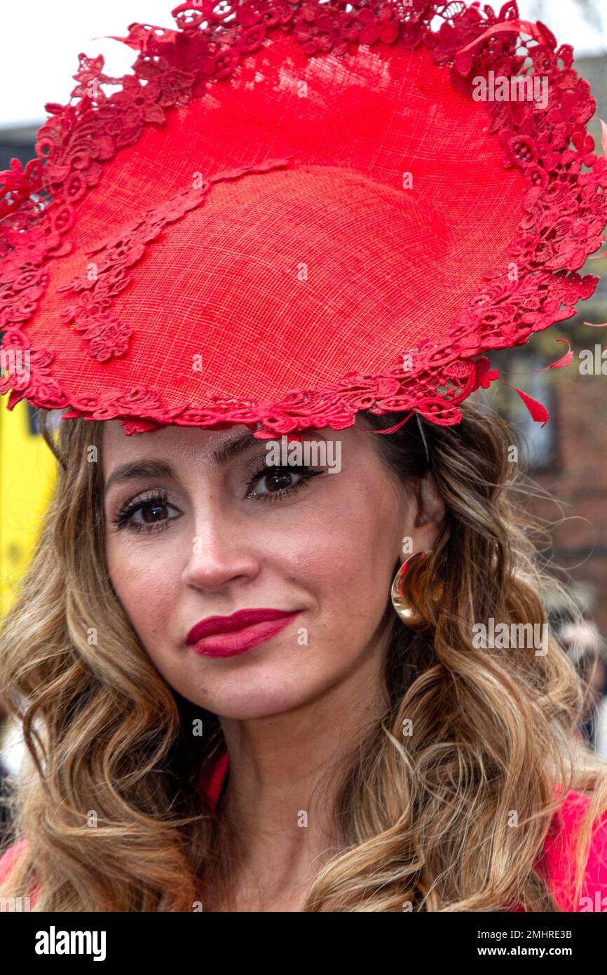 Women's high-end fashion, decorative fancy frocks and hats. Racegoers ...