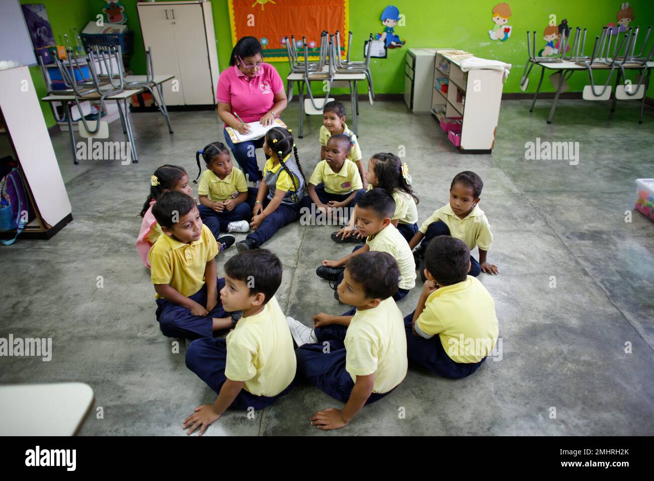 In this Oct. 7, 2019 photo, teacher Daixy Aguero take notes as she ...