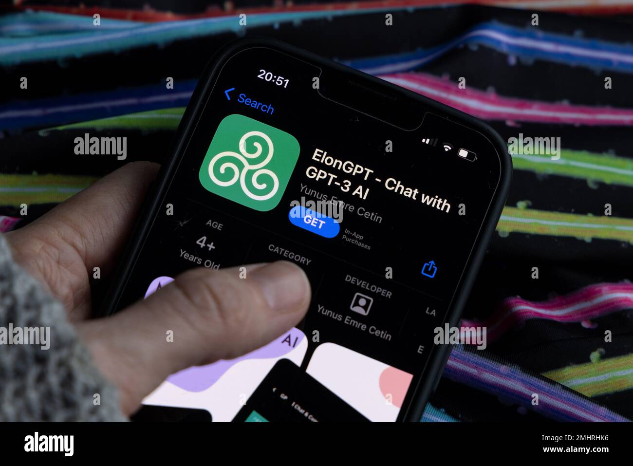 Woman's hand holding an iPhone with appstore and ChatGPT and Chat bot ...