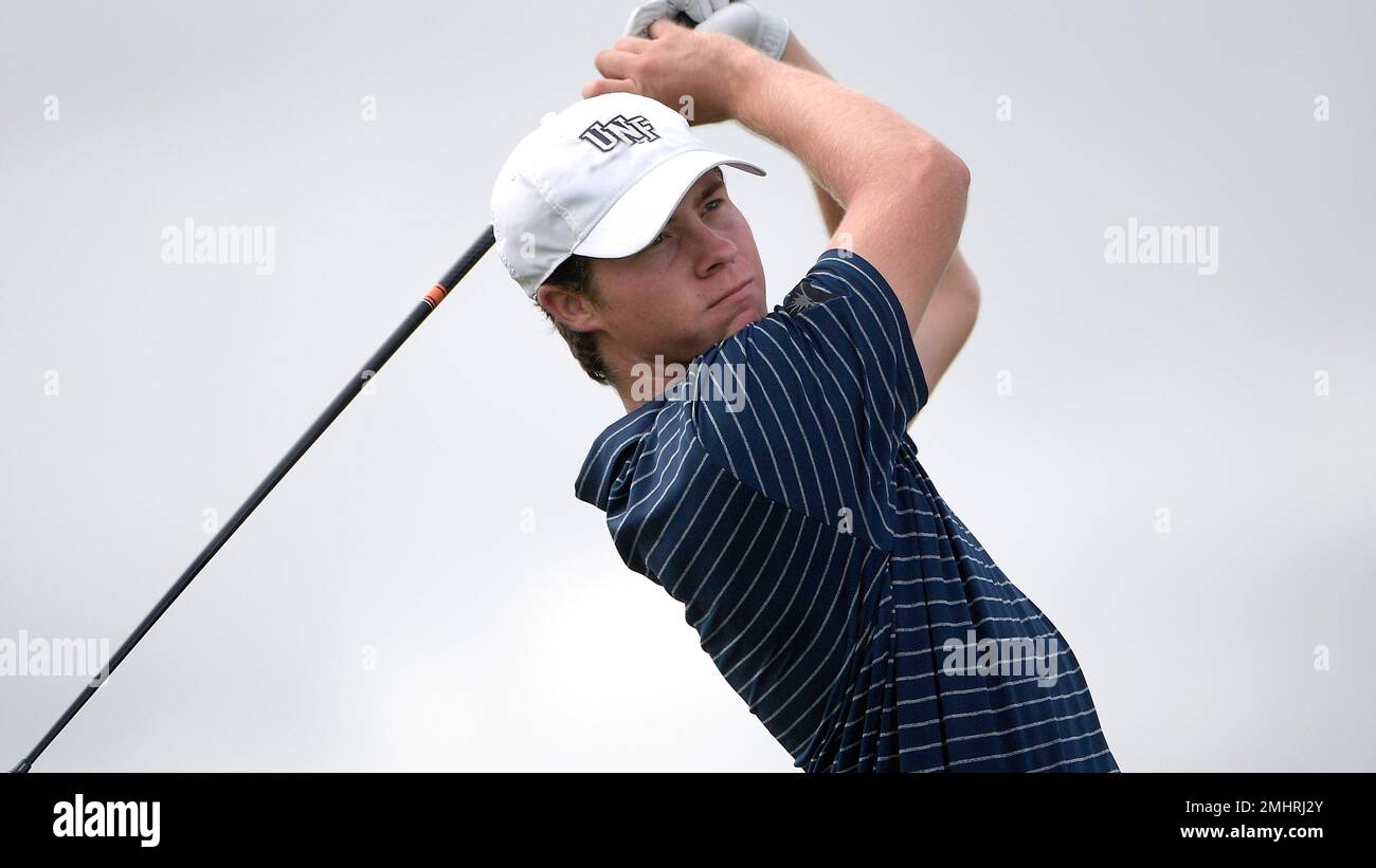 North Florida golfer Drew Angelo tees off on the 18th hole during the ...