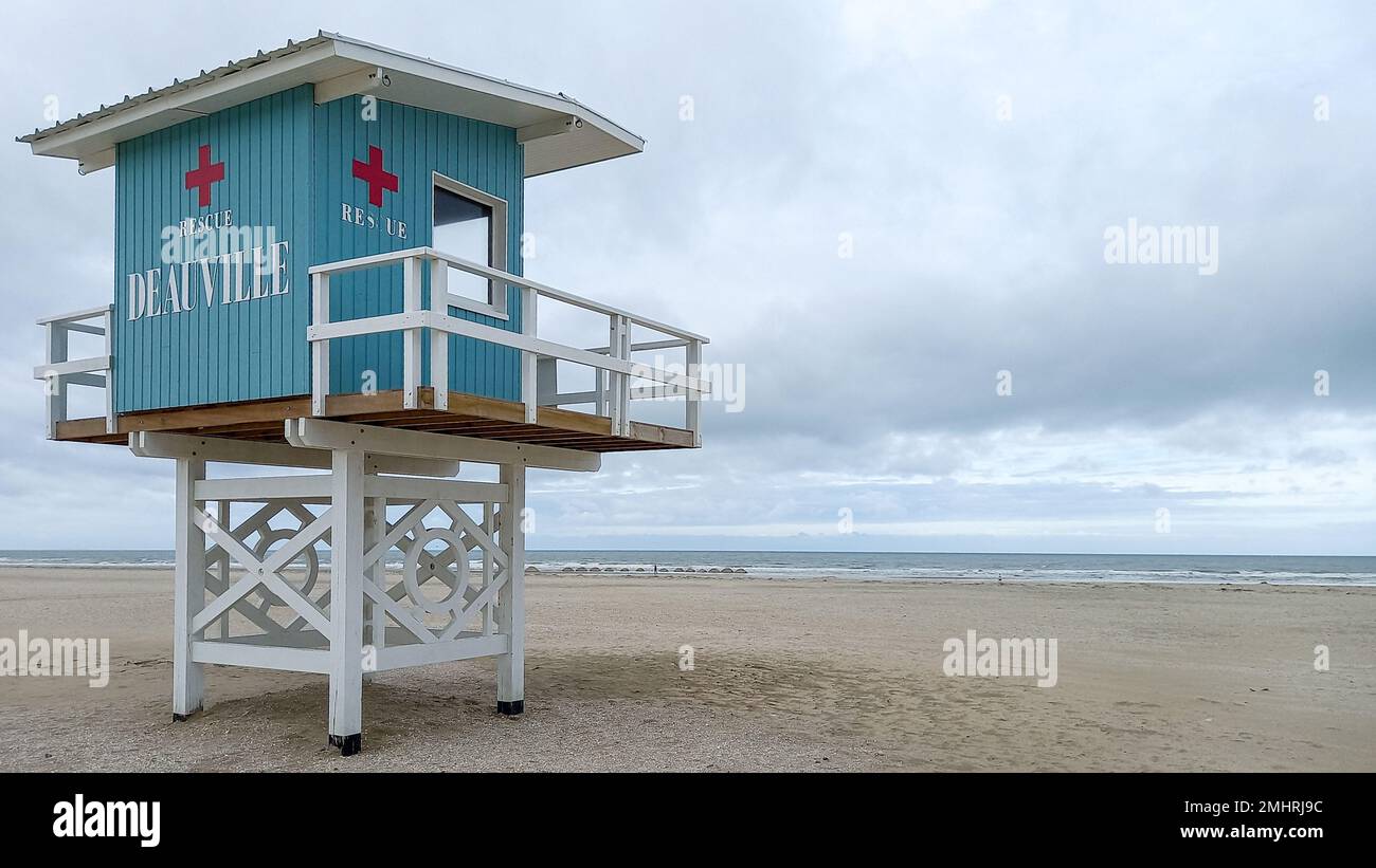 wooden hut white blue colors on stilts of the lifeguards on sand beach ...