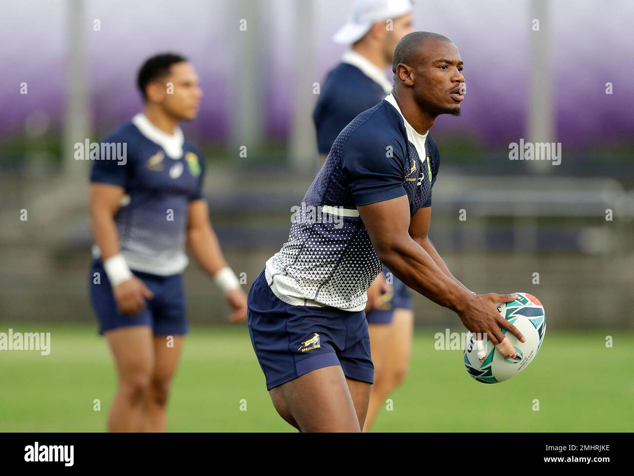 South Africa's Makazole Mapimpi runs with the ball during a training ...