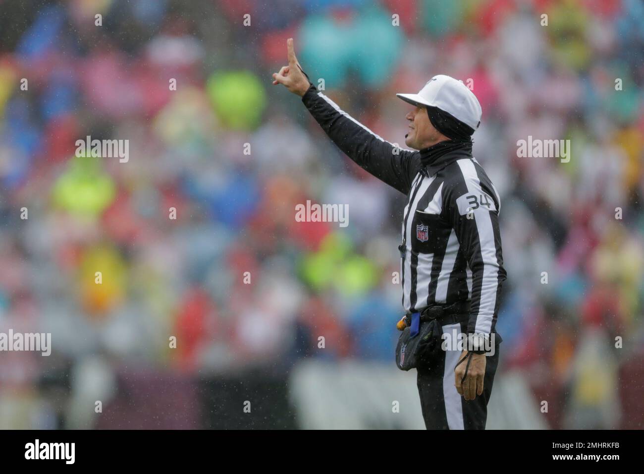 NFL referee Clete Blakeman (34) announces a call in the first half of ...