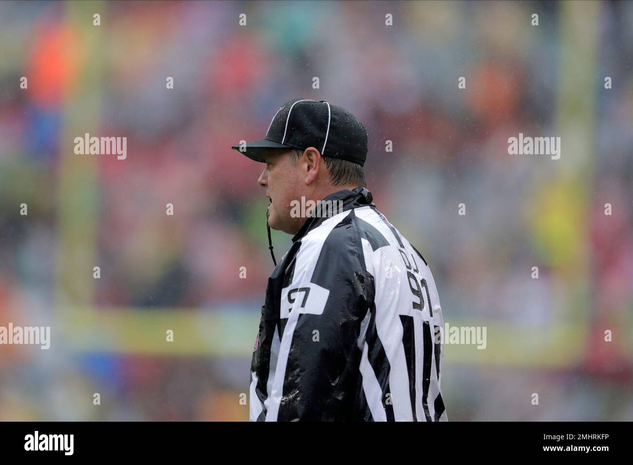 NFL head linesman Jerry Bergman (91) looks on in the second half of an ...