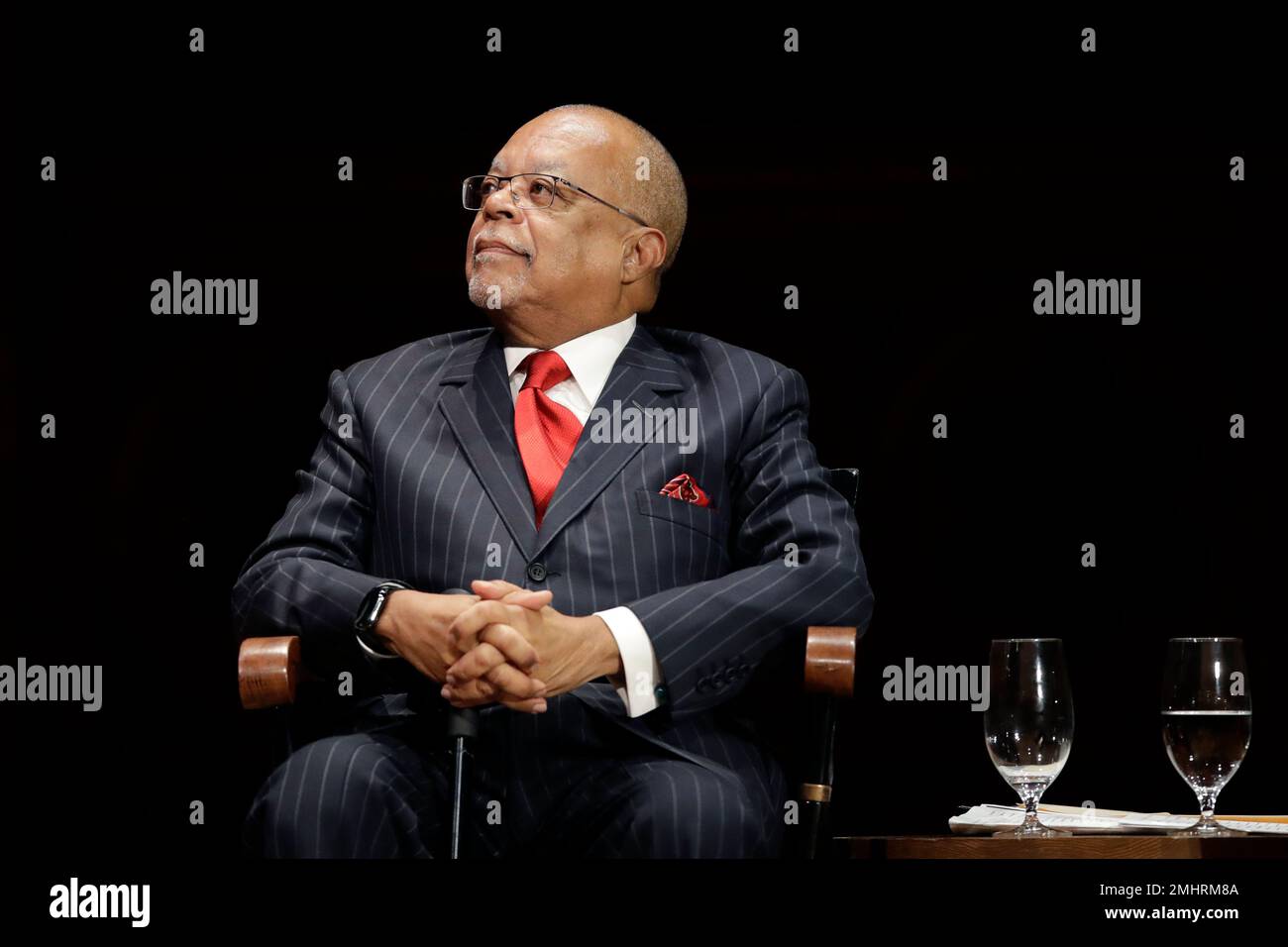 Harvard Professor Henry Louis Gates, Jr. listens during ceremonies on ...