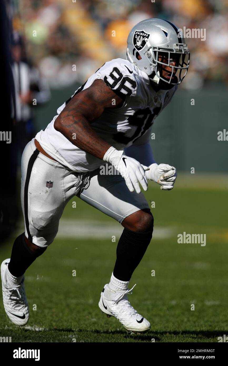 Oakland Raiders defensive end Clelin Ferrell (96) rushes in against the ...