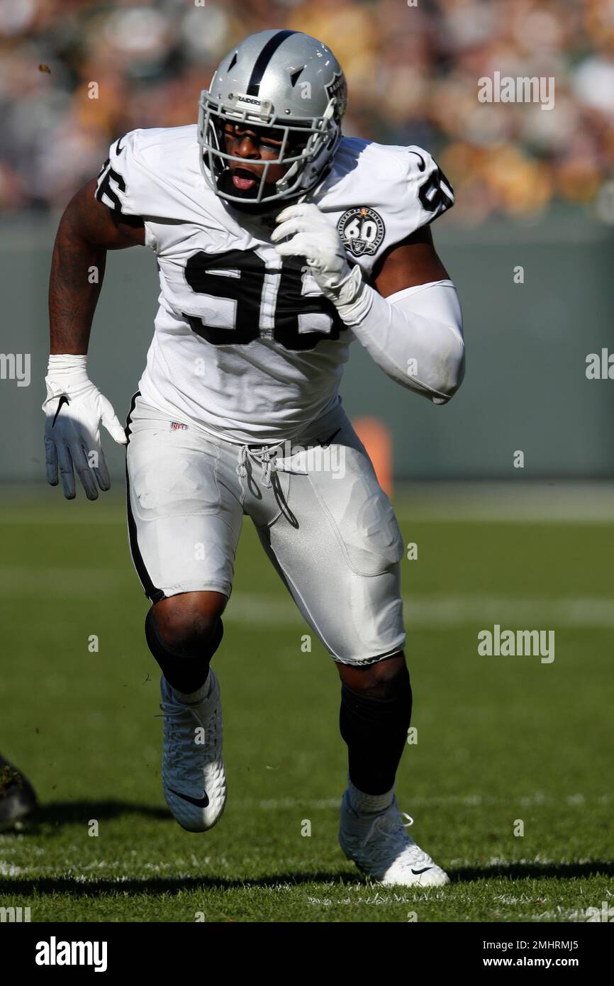 Oakland Raiders defensive end Clelin Ferrell (96) rushes in against the ...