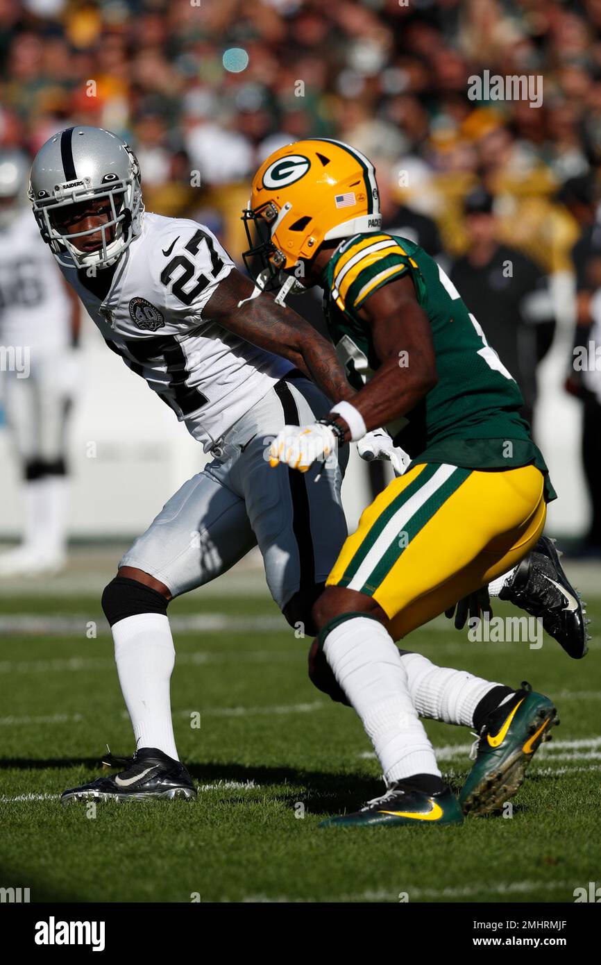 Oakland Raiders cornerback Trayvon Mullen (27) defends against the ...