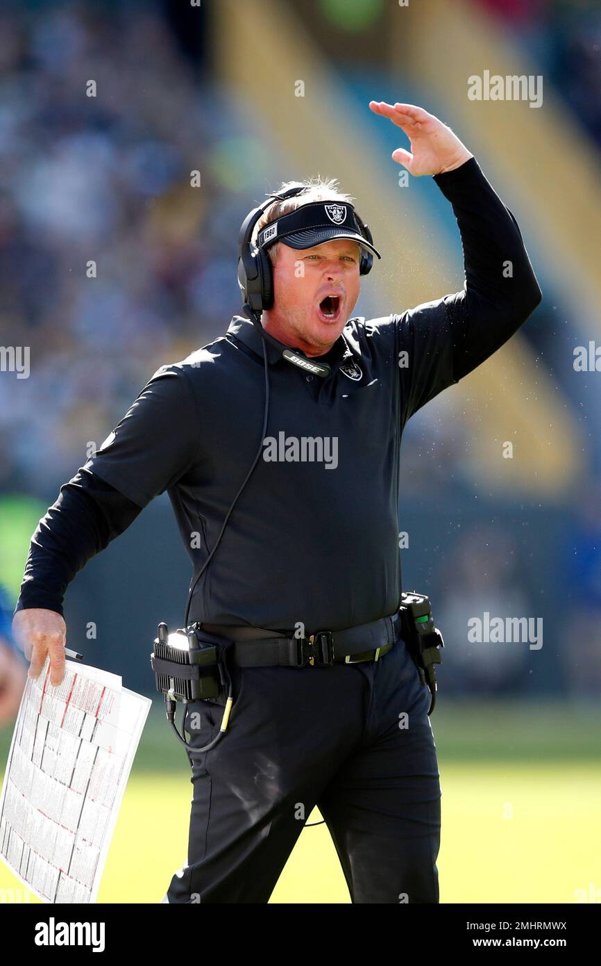 Oakland Raiders head coach Jon Gruden walks the sidelines yelling at ...