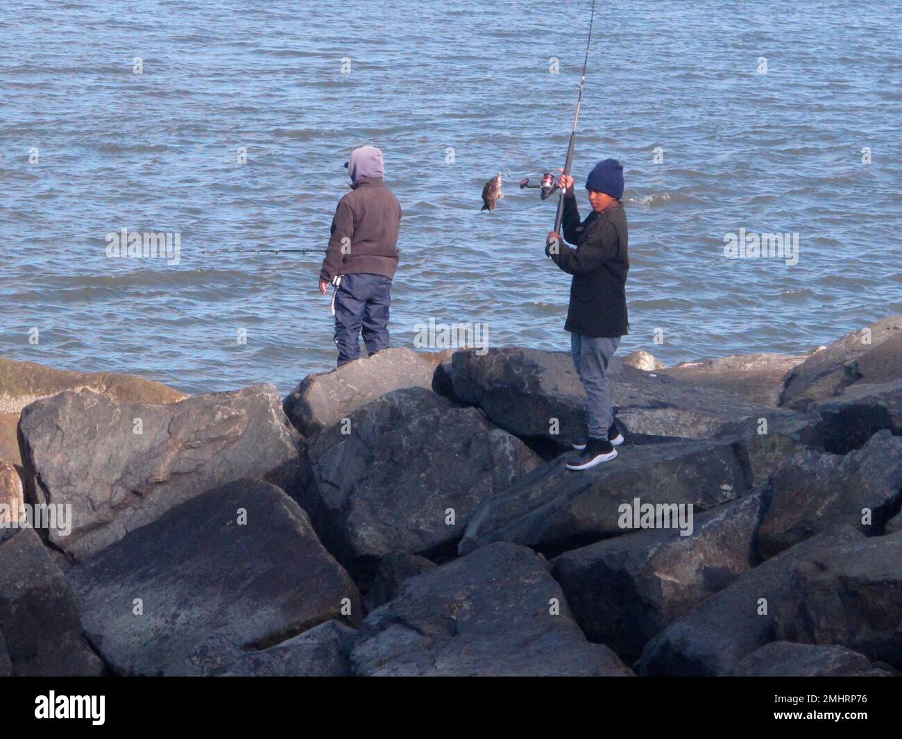 This Oct. 18, 2019 photo shows an angler catching a fish in Atlantic ...