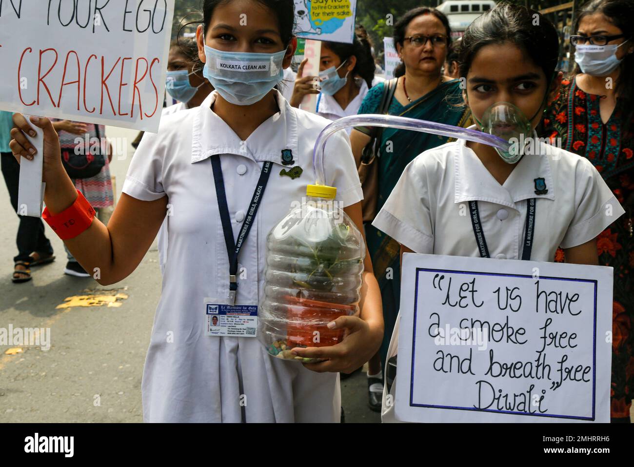 School students wear masks and walk in an air and sound pollution ...