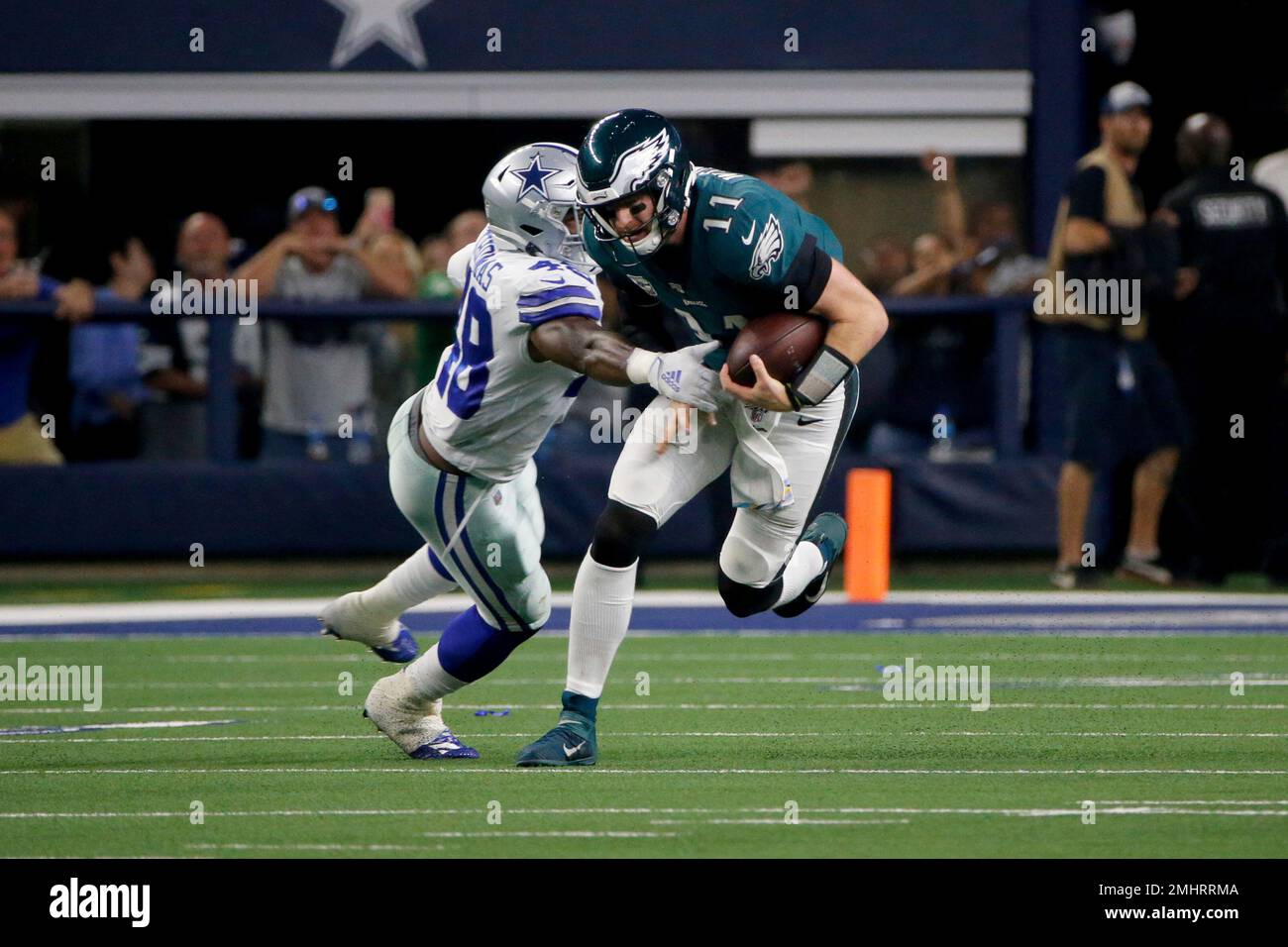 Dallas Cowboys linebacker Joe Thomas (48) attempts to stop Philadelphia ...