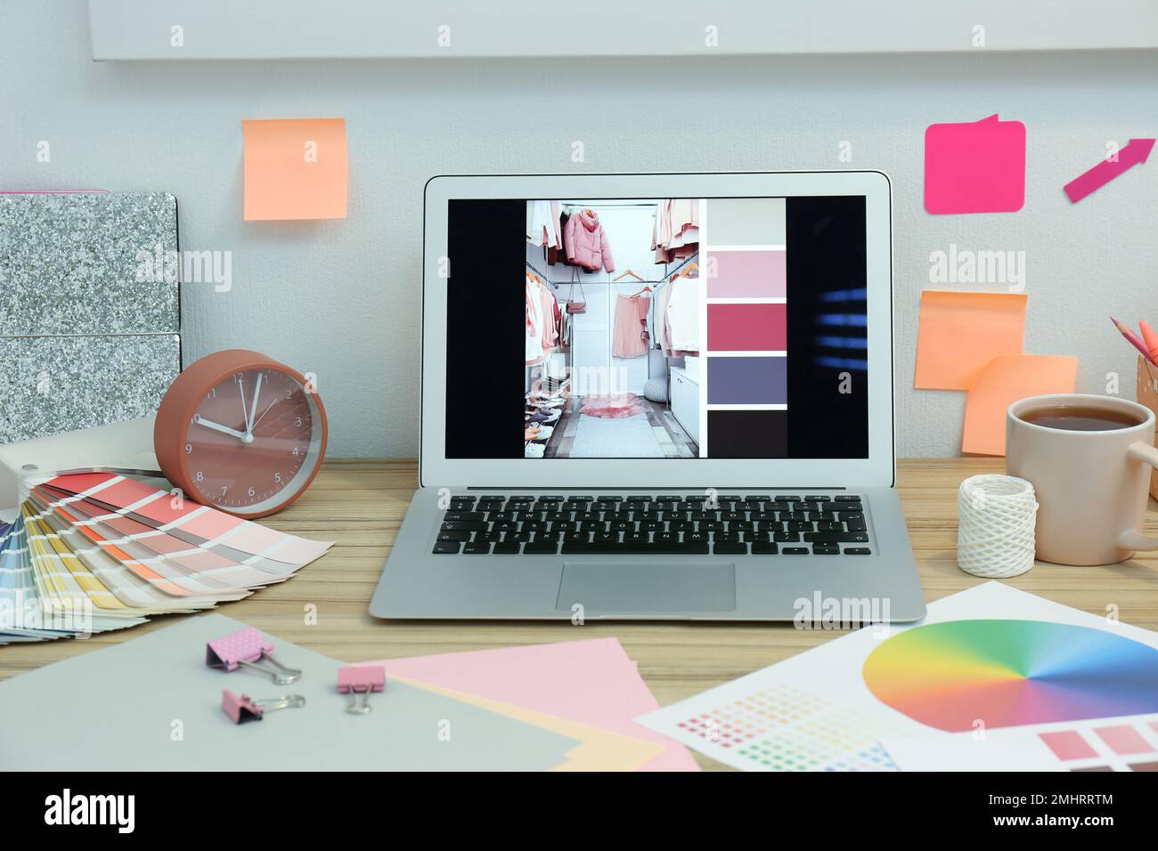 Designer's workplace with modern laptop and color palettes Stock Photo ...
