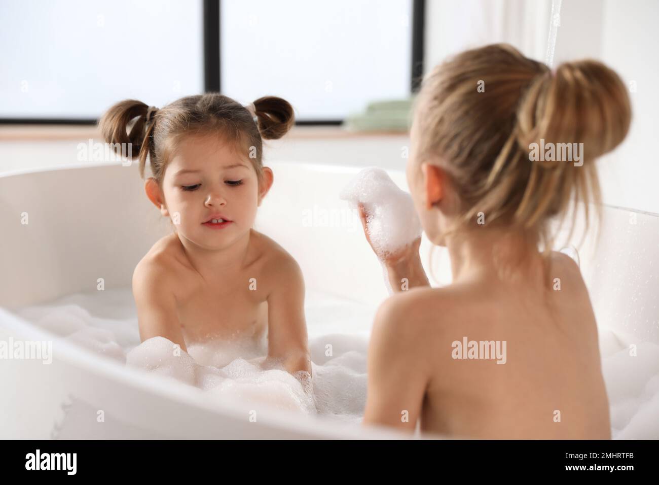 Cute little sisters taking bubble bath together Stock Photo - Alamy Cute little sisters taking bubble bath together Stock Photo - Alamy