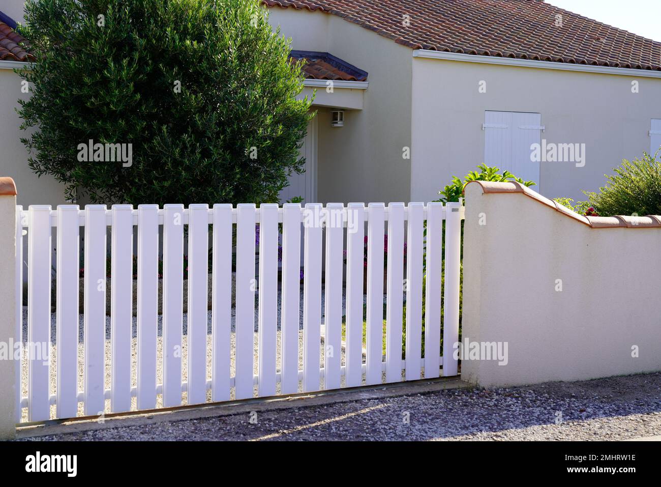 modern white gate pvc plastic portal with blades of suburbs house Stock ...