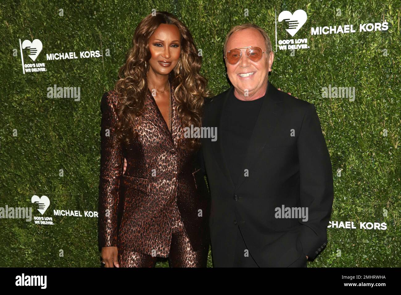 Iman, left, and Michael Kors attend the God's Love We Deliver Golden ...