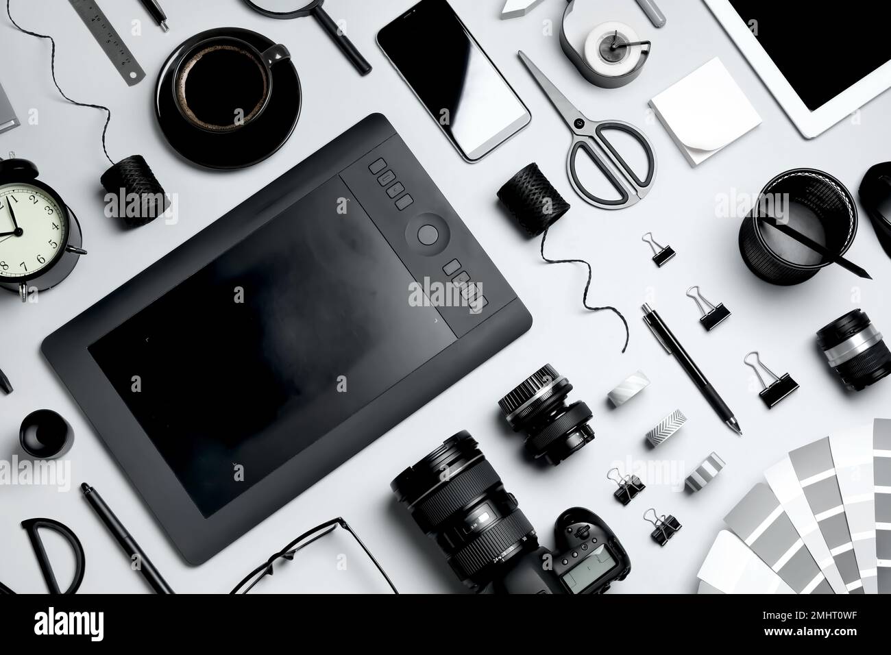 Flat lay composition with graphic drawing tablet and different office ...