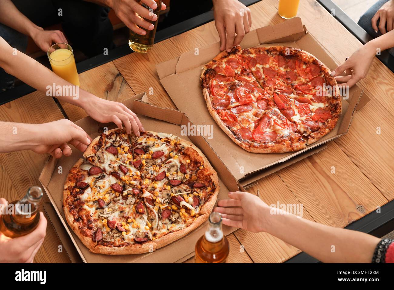 Girl eating slice pepperoni pizza hi-res stock photography and images ...
