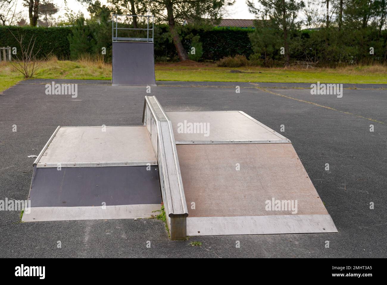 skateboarding on urban skatepark ramp in town Stock Photo - Alamy