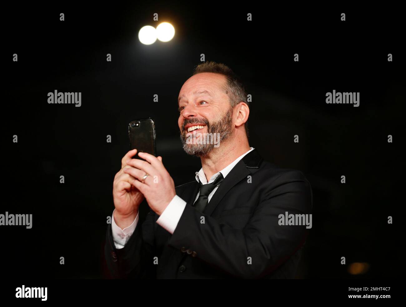 Actor Gil Bellows arrives on the red carpet for the screening of ...