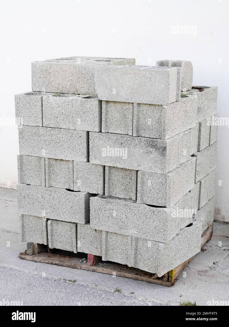cement concrete blocks on wooden palettes Stock Photo - Alamy