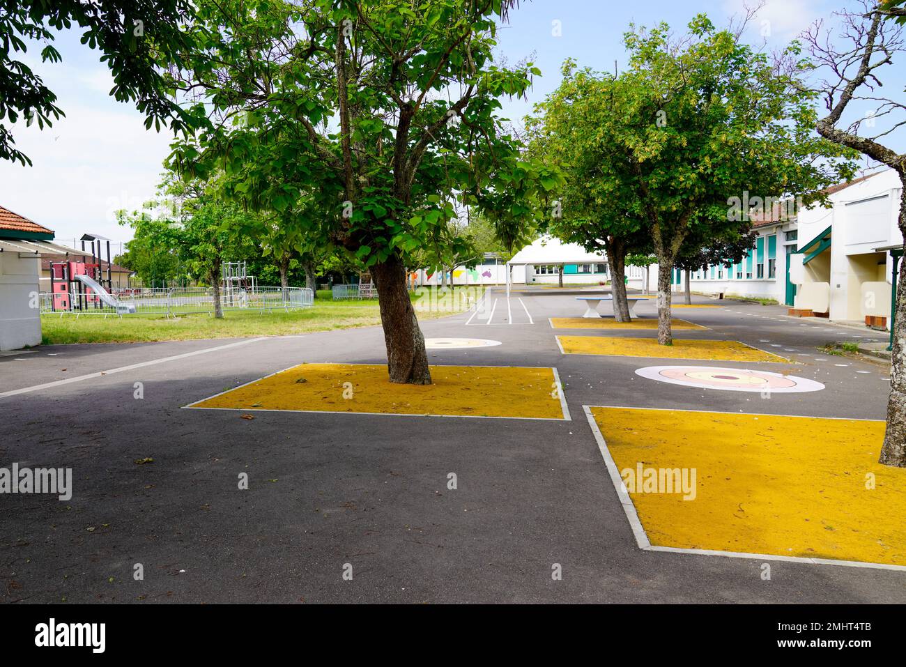 school kids outdoors building exterior with children playground on ...