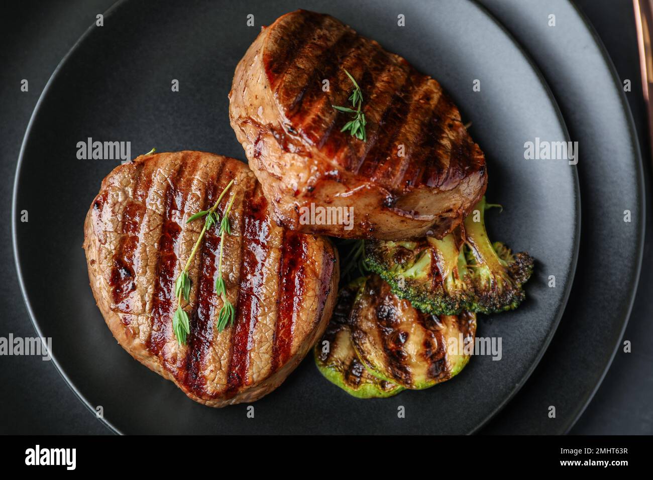 Top view of delicious grilled beef medallions Stock Photo - Alamy