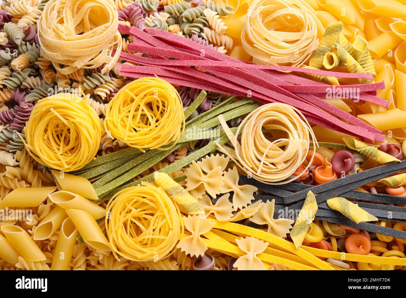 Different types of pasta as background, top view Stock Photo - Alamy
