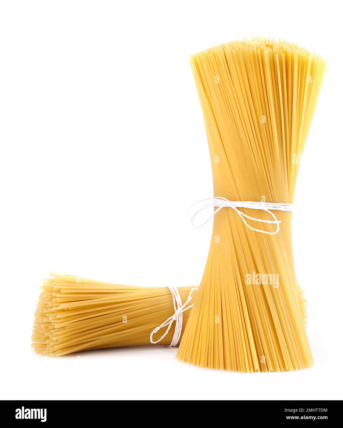Tied uncooked Italian spaghetti isolated on white Stock Photo - Alamy