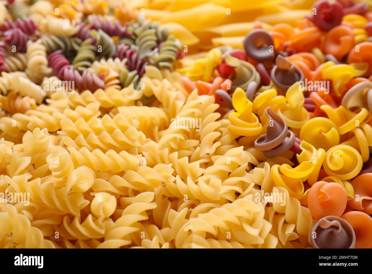 Different types of pasta as background, closeup Stock Photo - Alamy