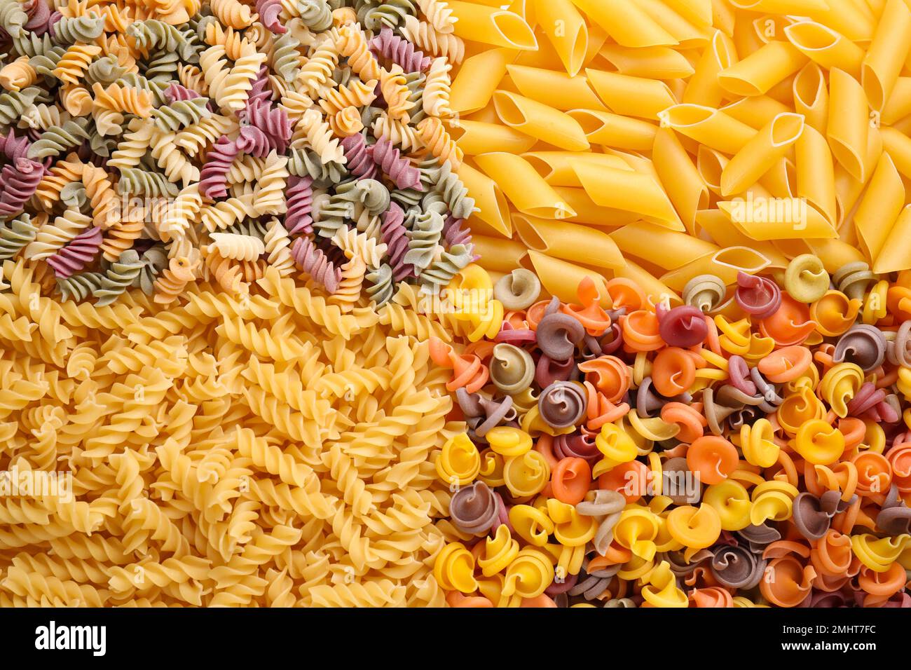 Different types of pasta as background, top view Stock Photo - Alamy