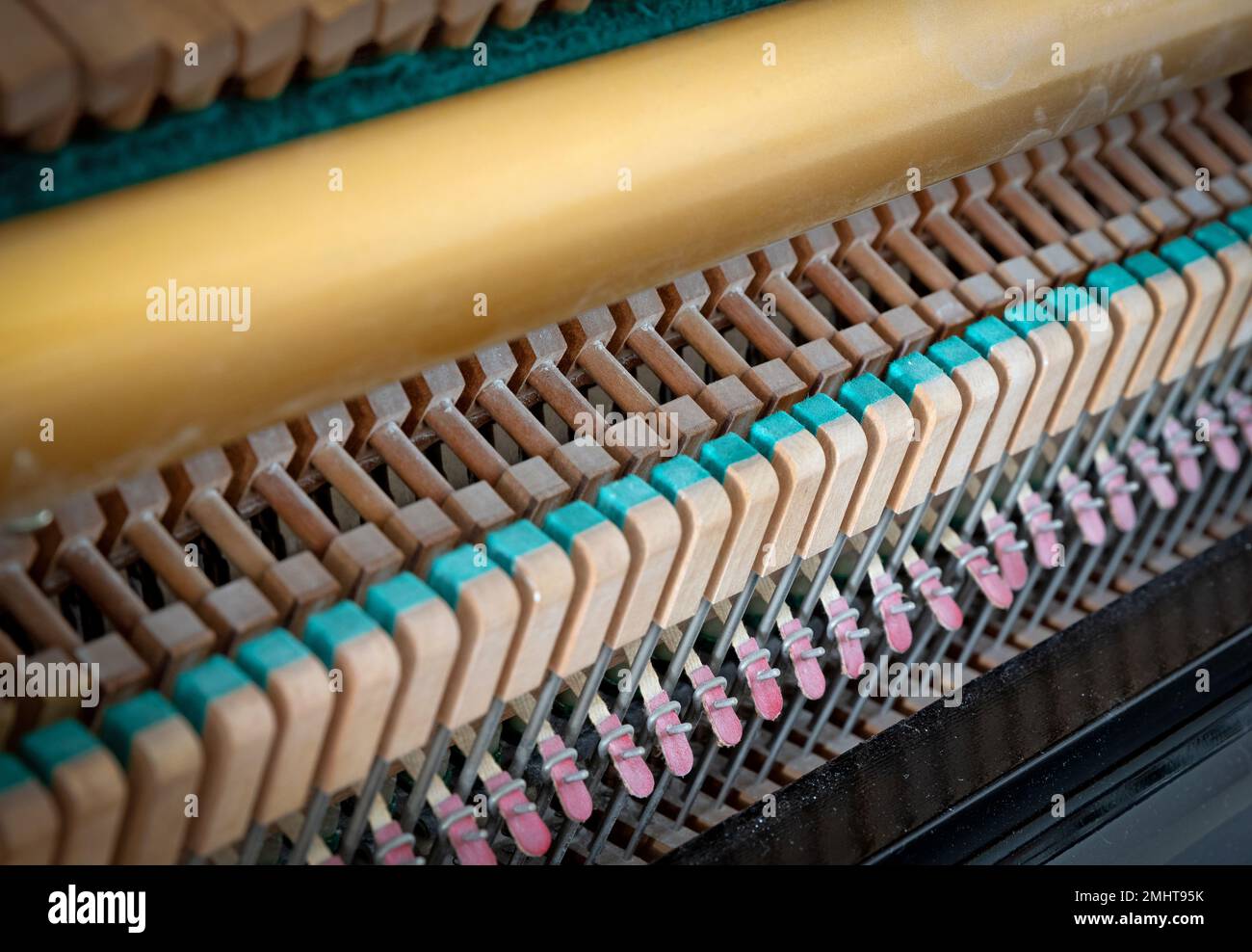 Details of piano mechanism gavel - string, pins and hammers, piano from ...