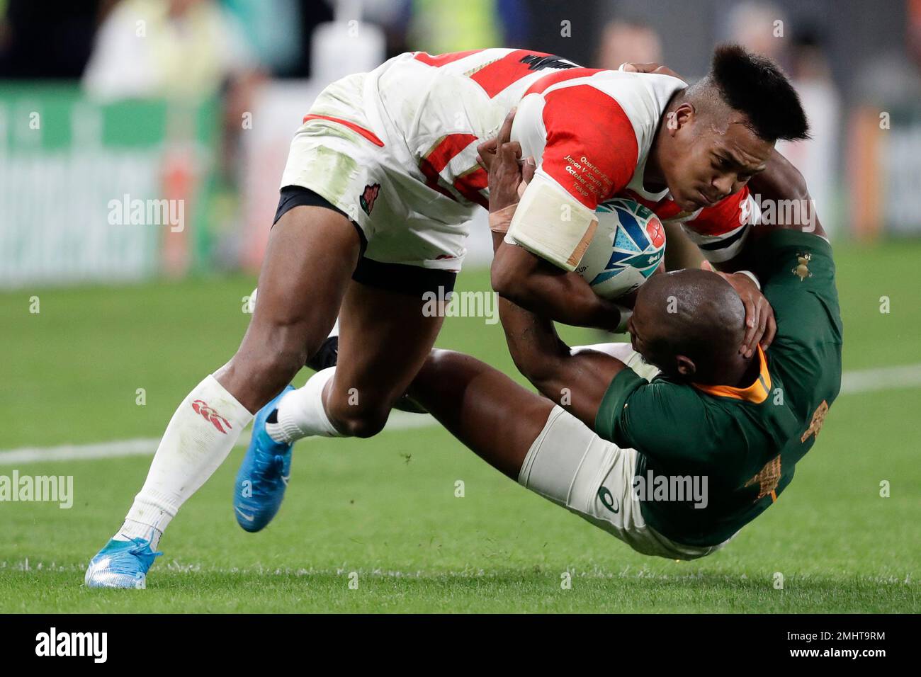 South Africa's Makazole Mapimpi tackles Japan's Kotaro Matsushima ...