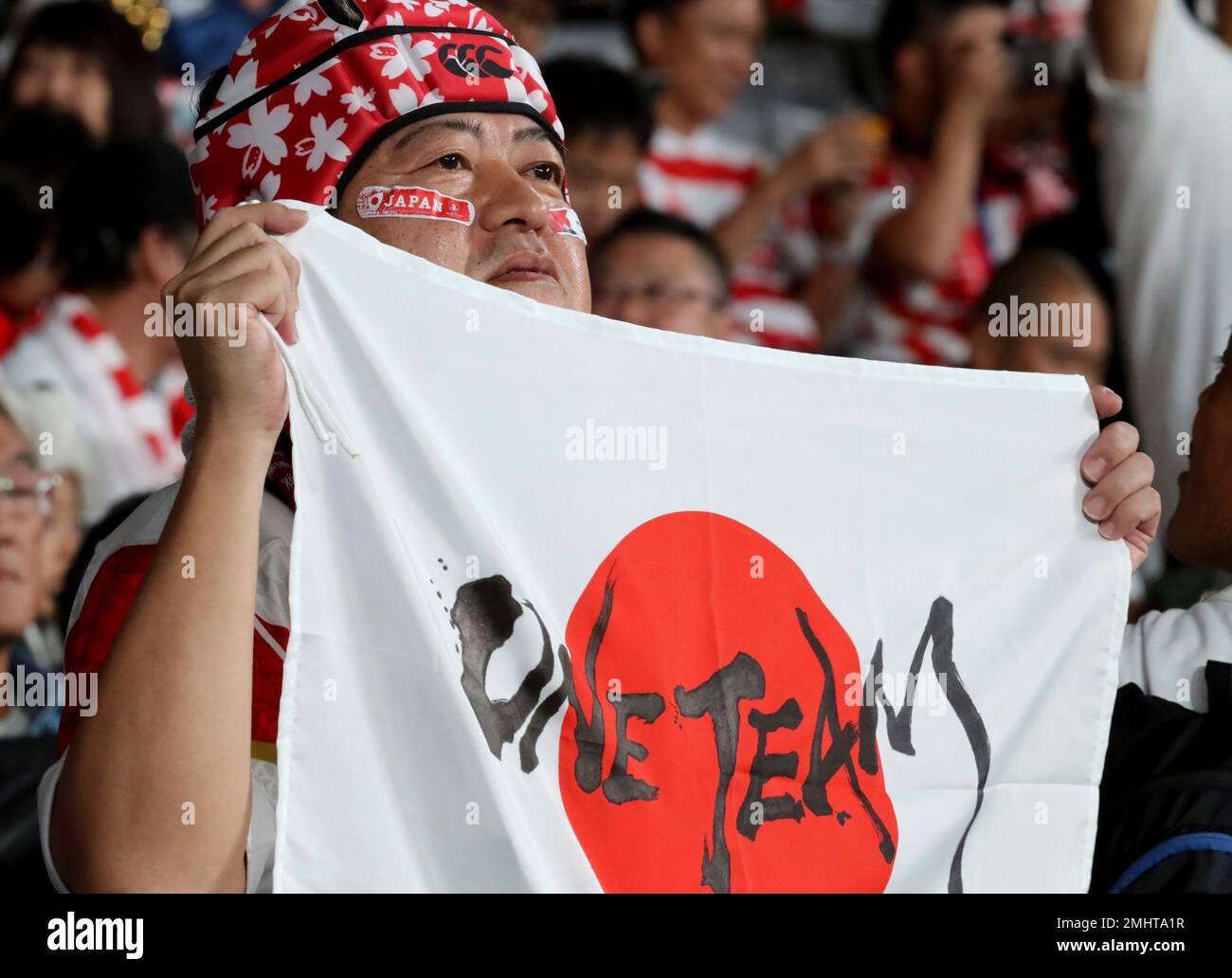A Japan fan cheers ahead of the Rugby World Cup quarterfinal match at ...