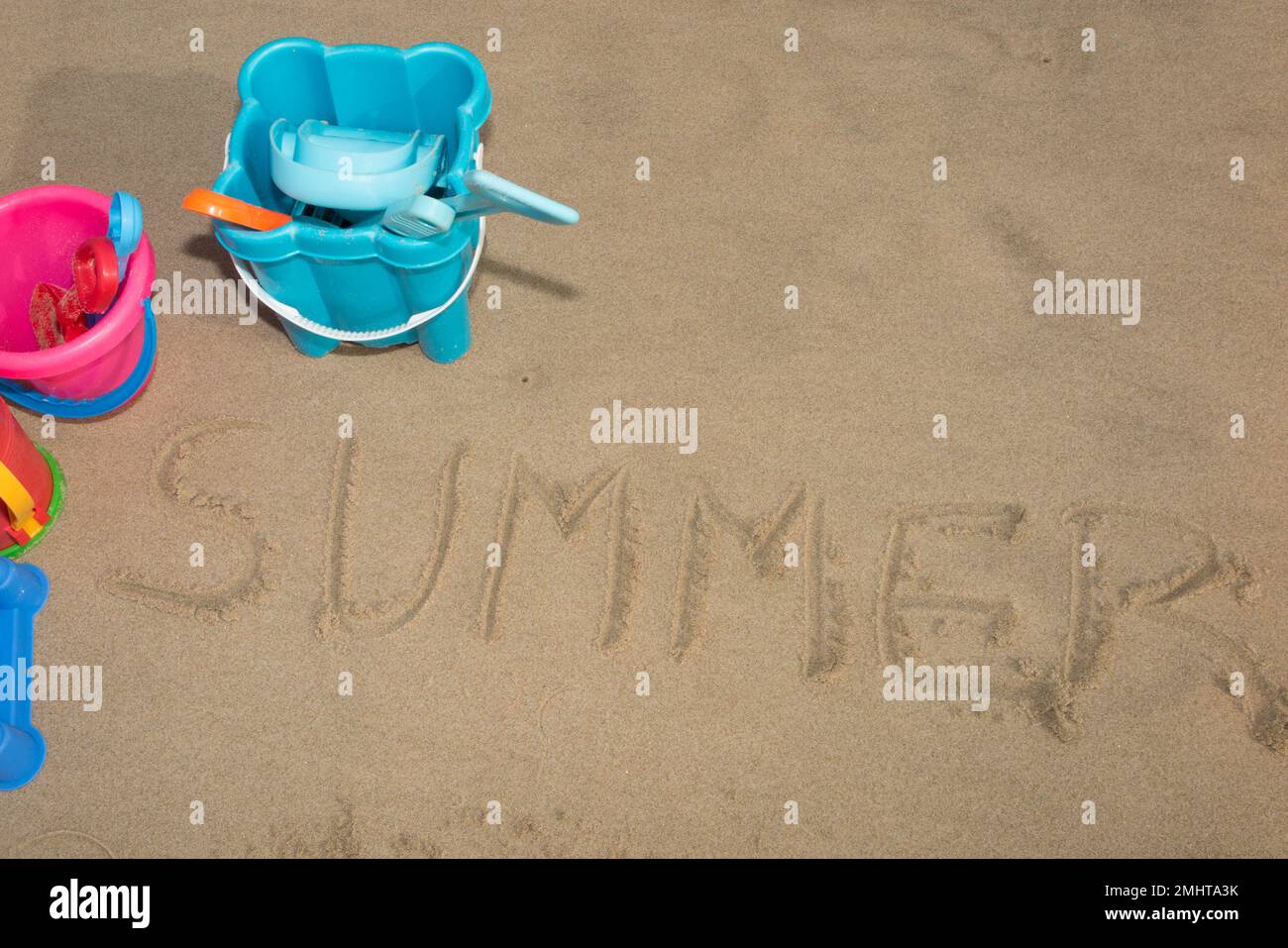 summer writing in sand and toys plastic for kids for playing on the ...