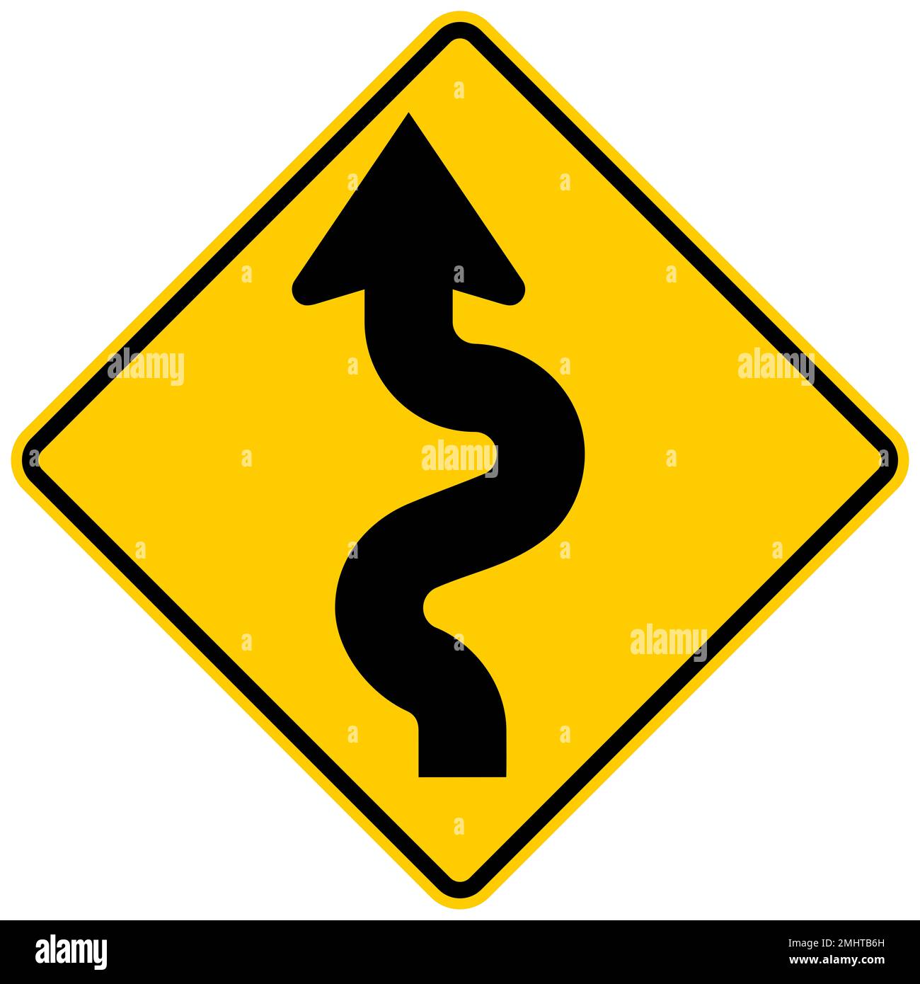 Winding road warning sign Stock Photo - Alamy