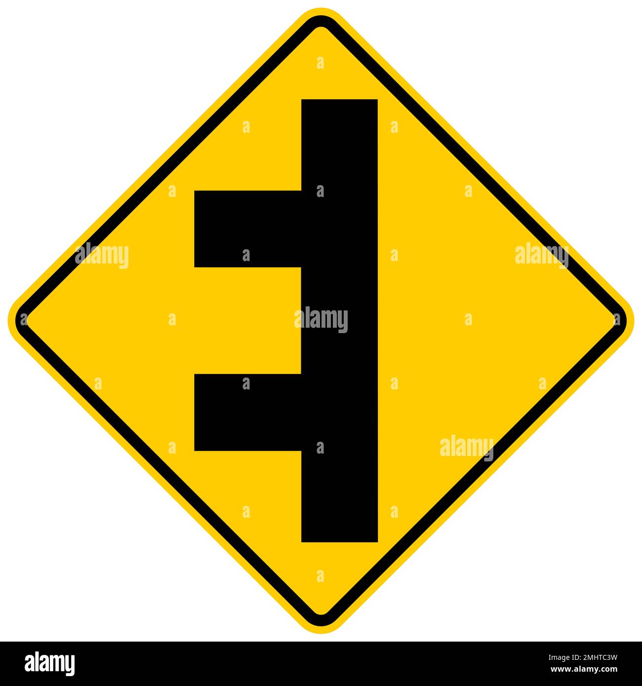 Double side road intersection warning sign Stock Photo - Alamy