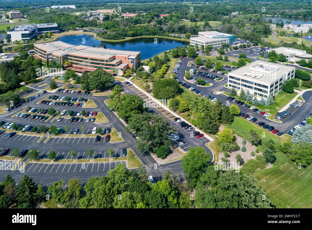 Aerial view of an suburban office park with parking lot and pond Stock ...