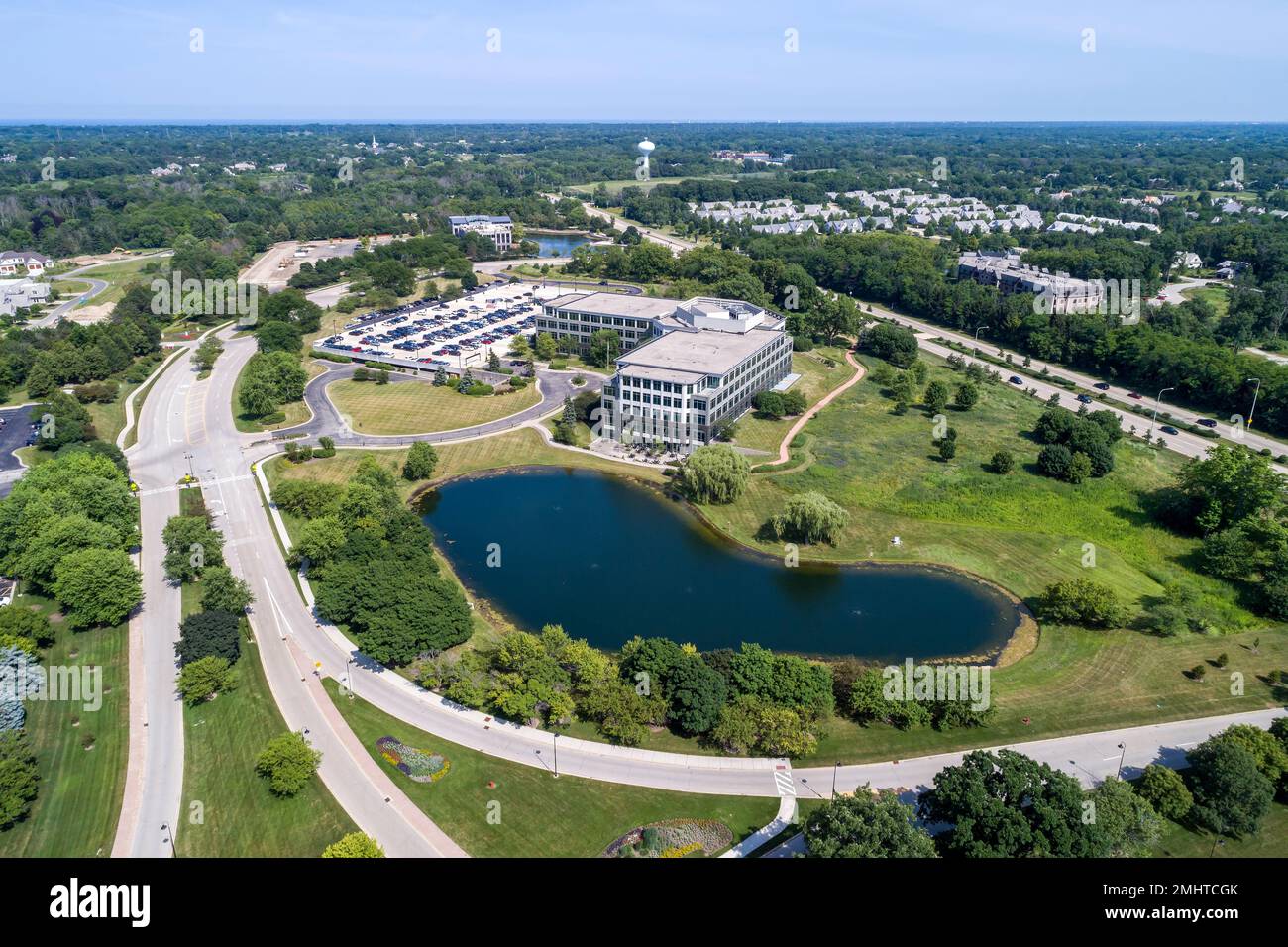Aerial view of an suburban office park with parking lot and pond Stock ...