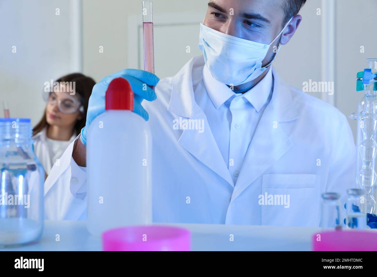 Scientist holding test tube with liquid indoors. Laboratory analysis ...