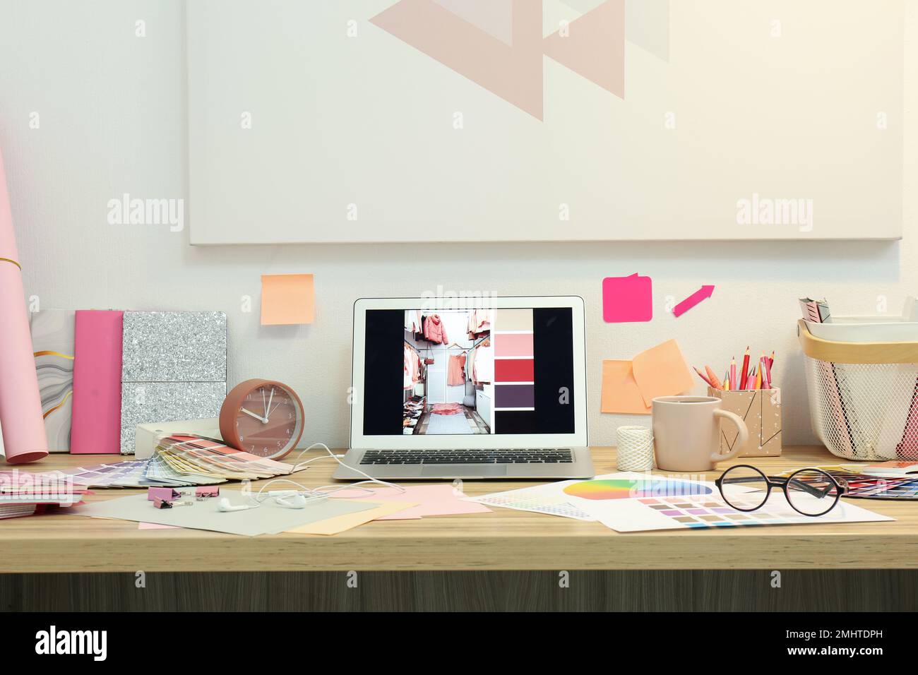 Designer's workplace with modern laptop and color palettes Stock Photo ...