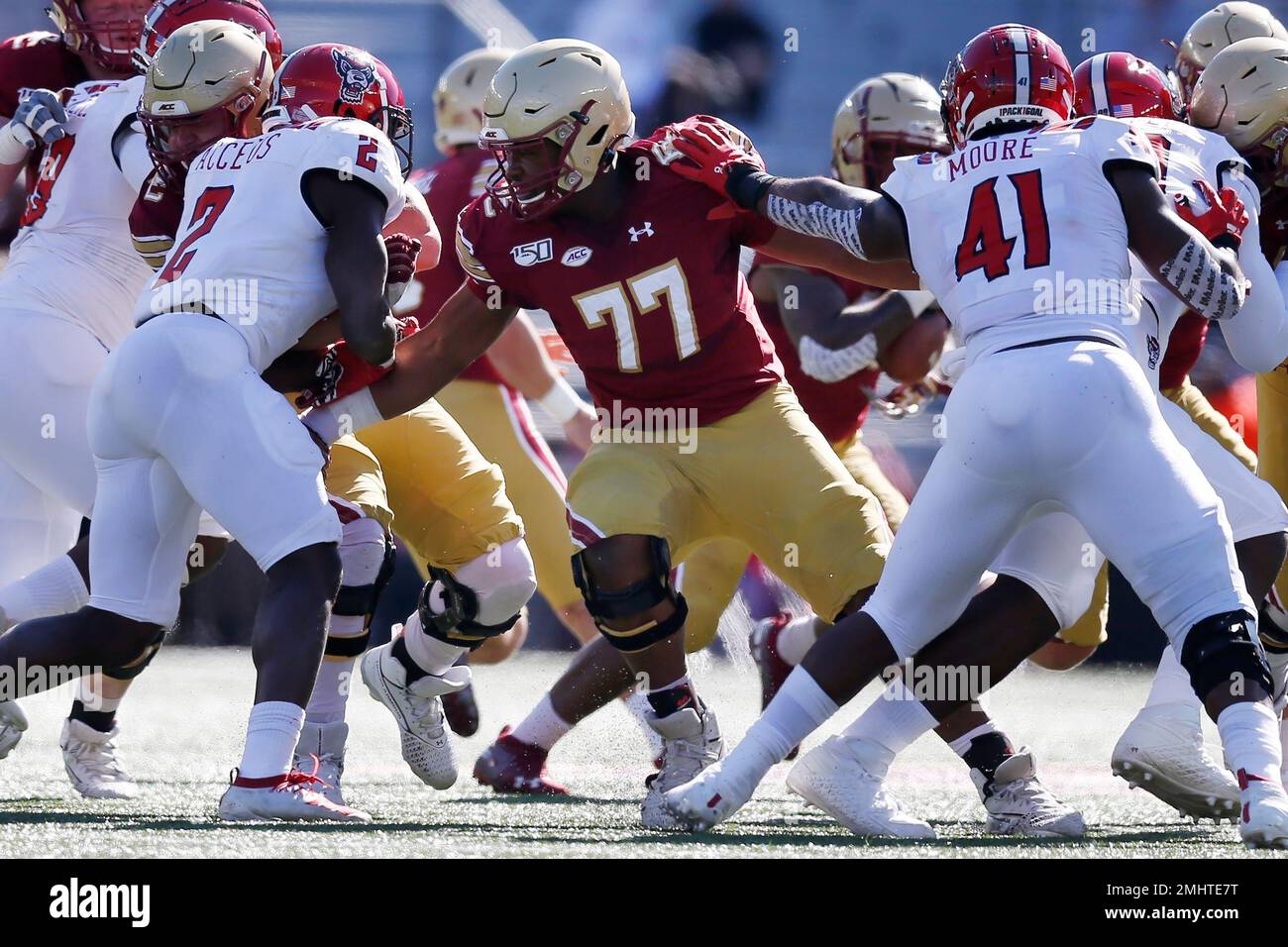 Boston College offensive lineman Zion Johnson (77) plays against North ...