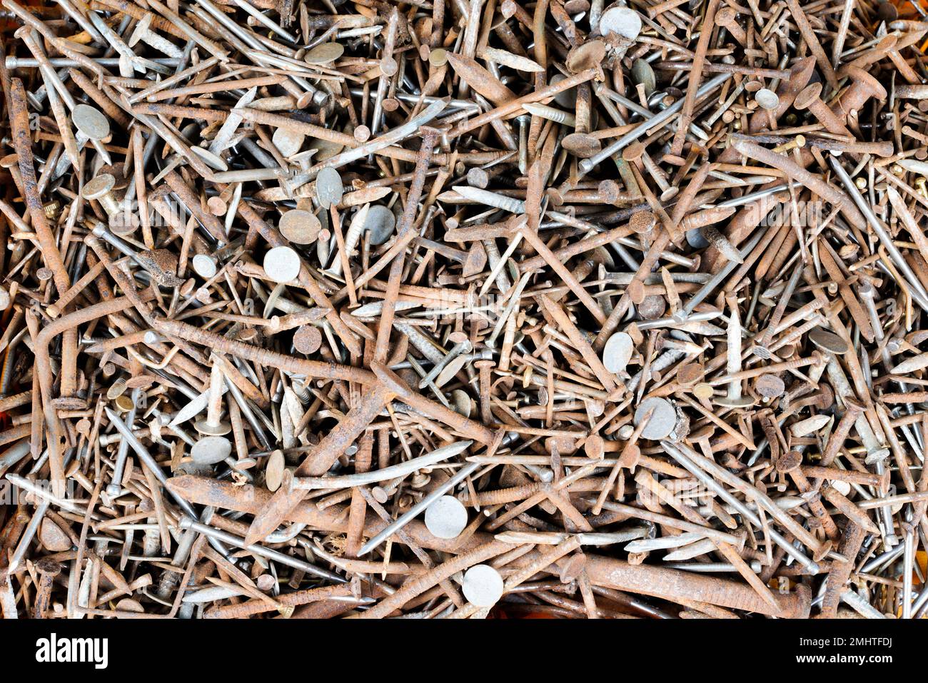 old ancient rusty and used metal nails in flat lay background Stock ...