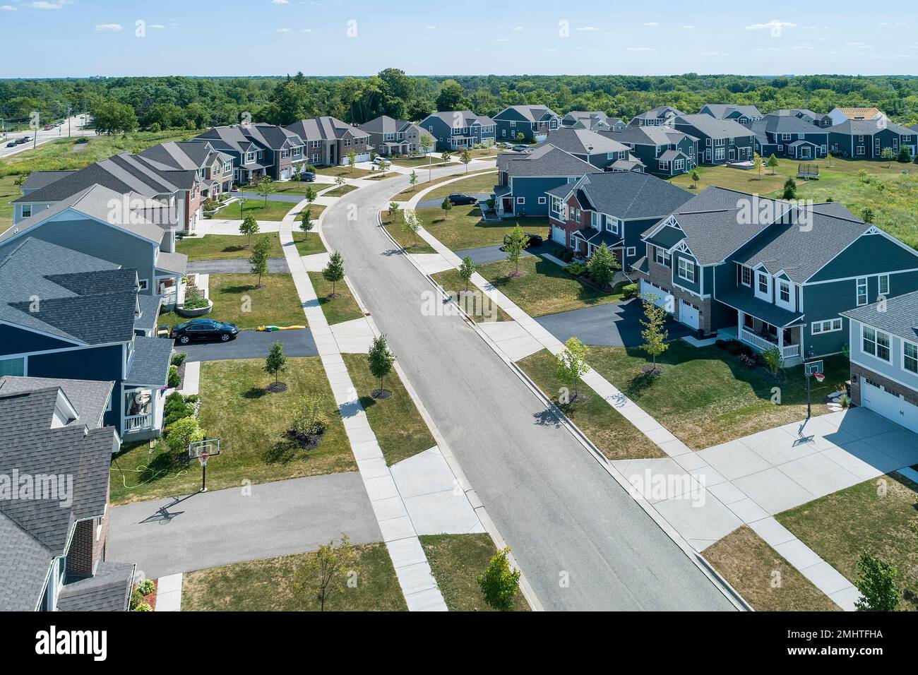 Aerial view of a housing community in a neighborhood suburban location ...