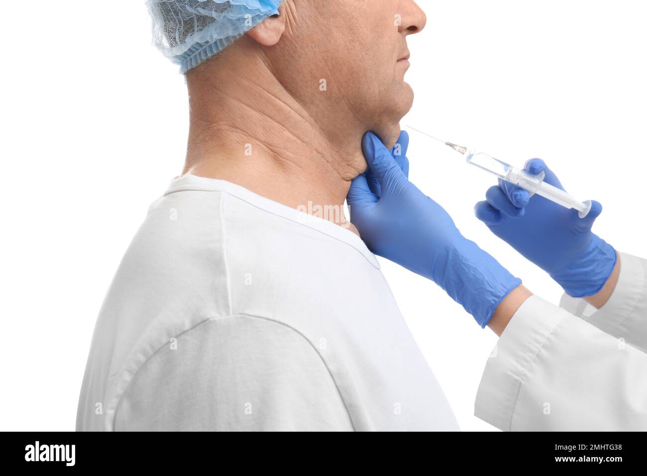Mature man with double chin receiving injection on white background ...
