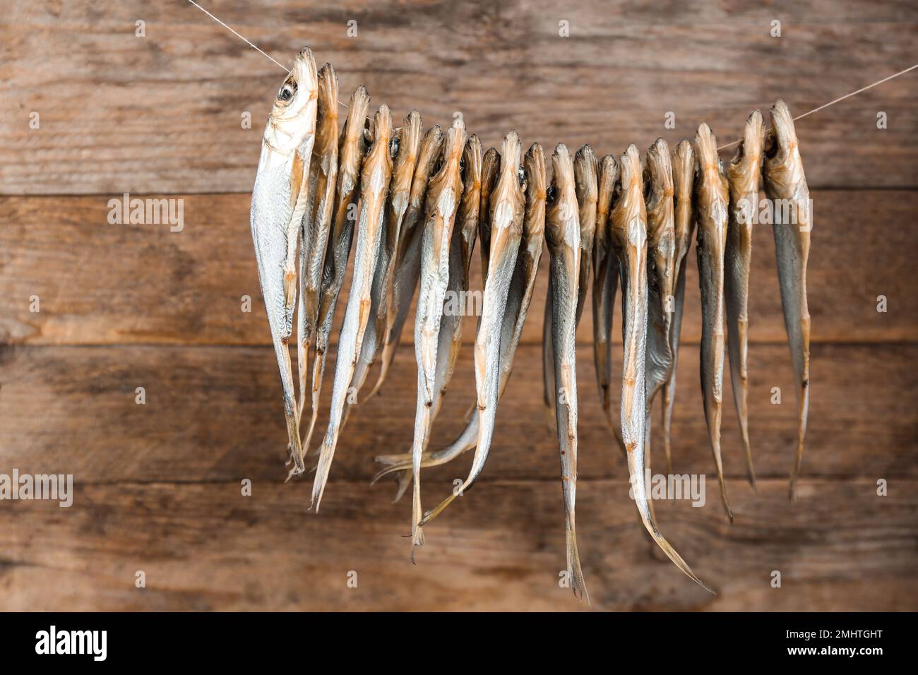 Stockfish hanging on rope hi-res stock photography and images - Alamy