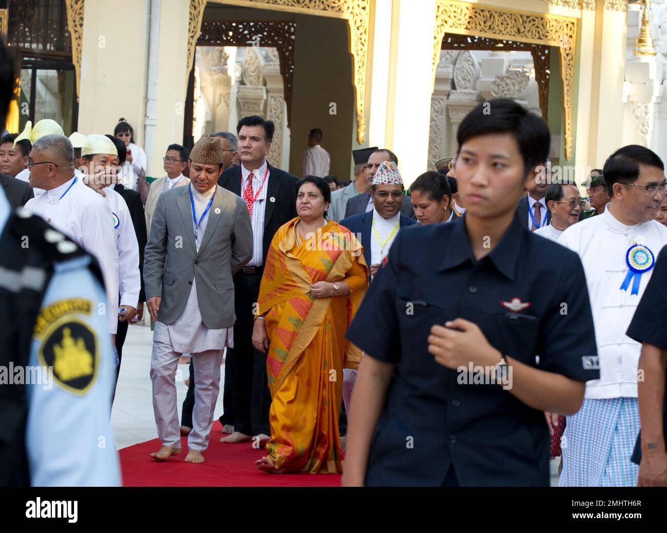 Nepali President Bidya Devi Bhandari, center, walks as she visits Myanmar famous Shwedagon ...