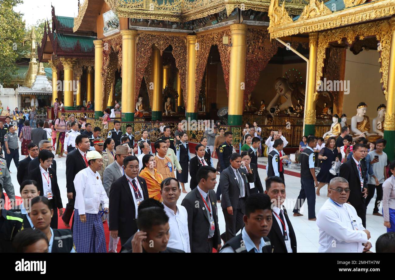 Nepali President Bidya Devi Bhandari, center, walks as she visits Myanmar famous Shwedagon ...