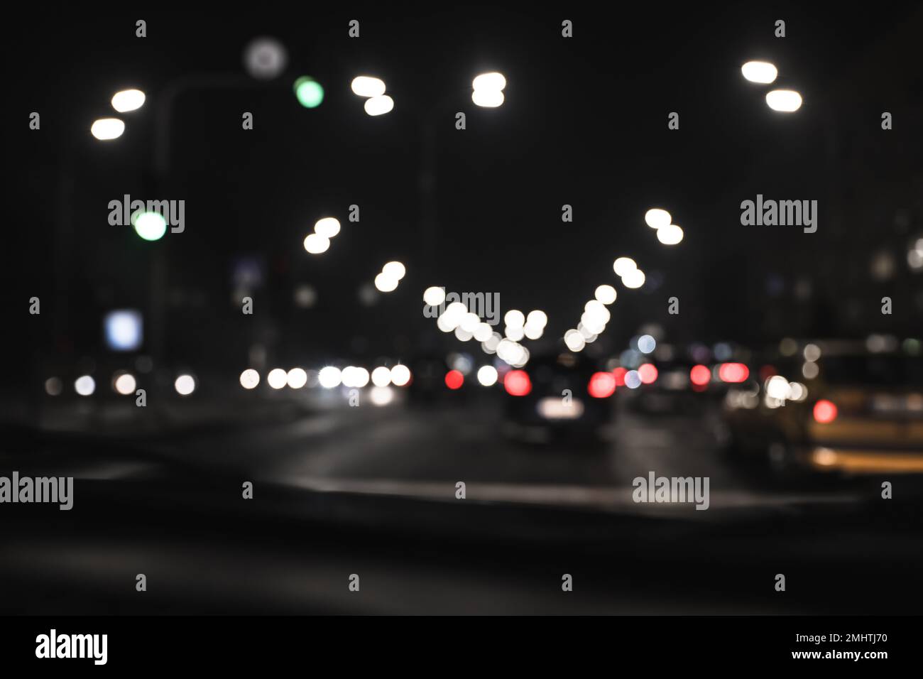 Blurred view of road with cars at night. Bokeh effect Stock Photo - Alamy